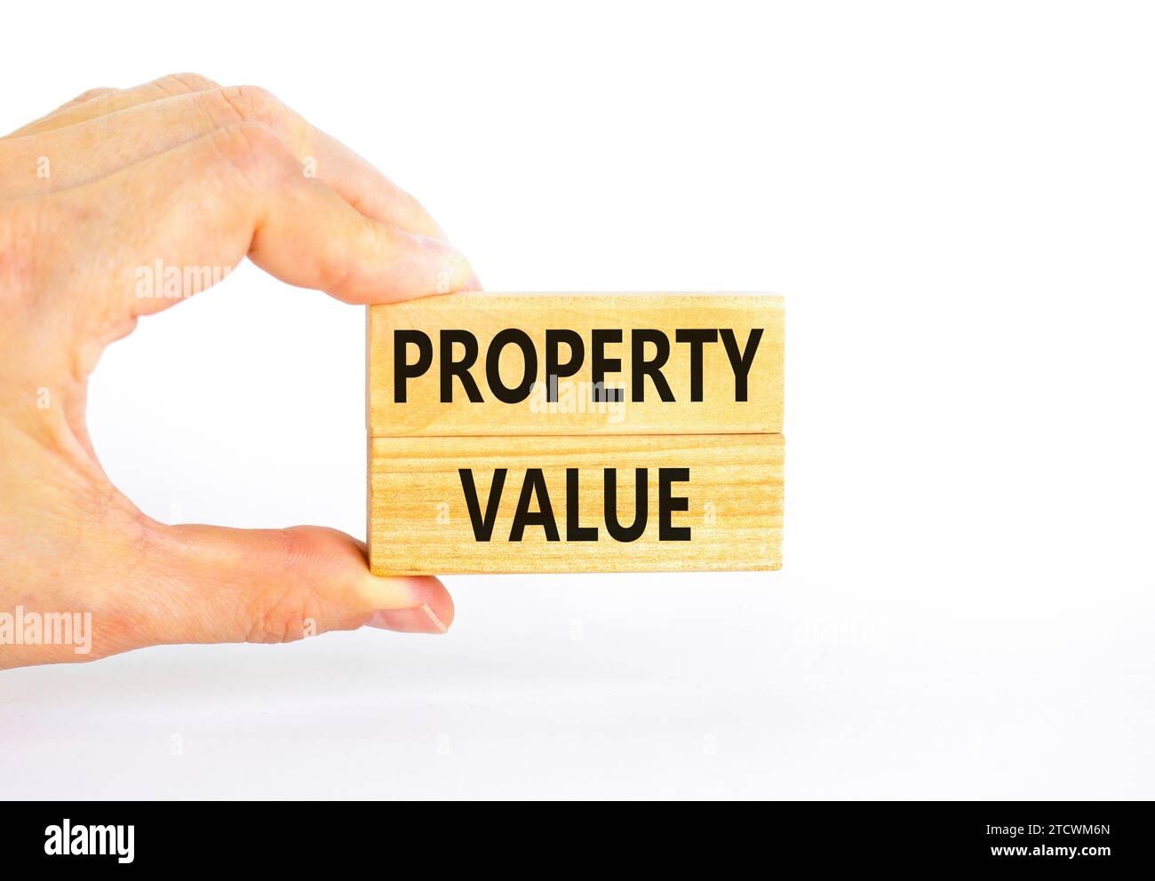 Property value symbol. Concept words Property value on beautiful wooden ...