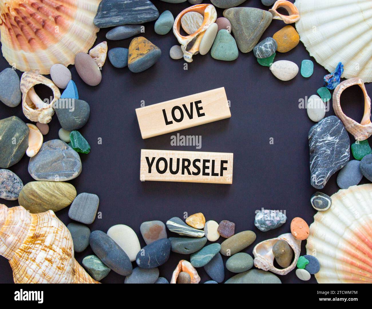 Love yourself symbol. Concept words Love yourself on beautiful wooden ...