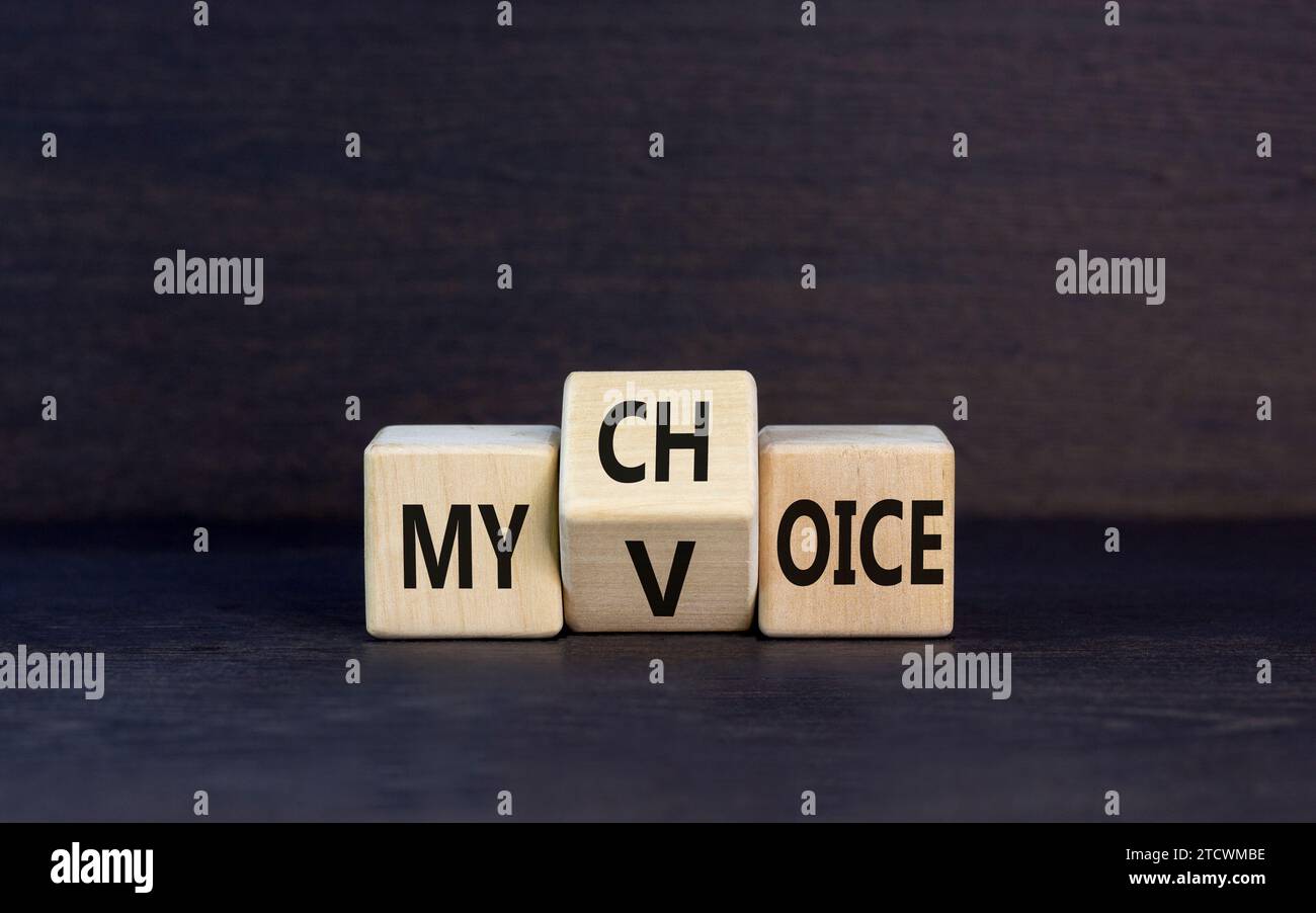 My voice choice symbol. Businessman turns wooden cubes and changes the ...
