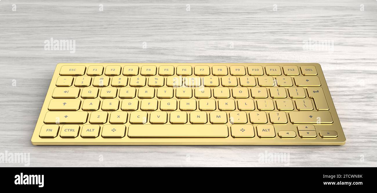 Luxury golden computer keyboard on grey wooden desk Stock Photo - Alamy