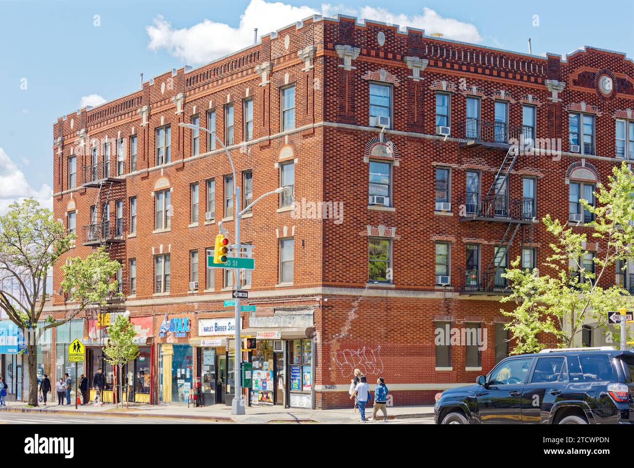 Polychrome brick and cast stone enliven Avalon Court, a four-story ...