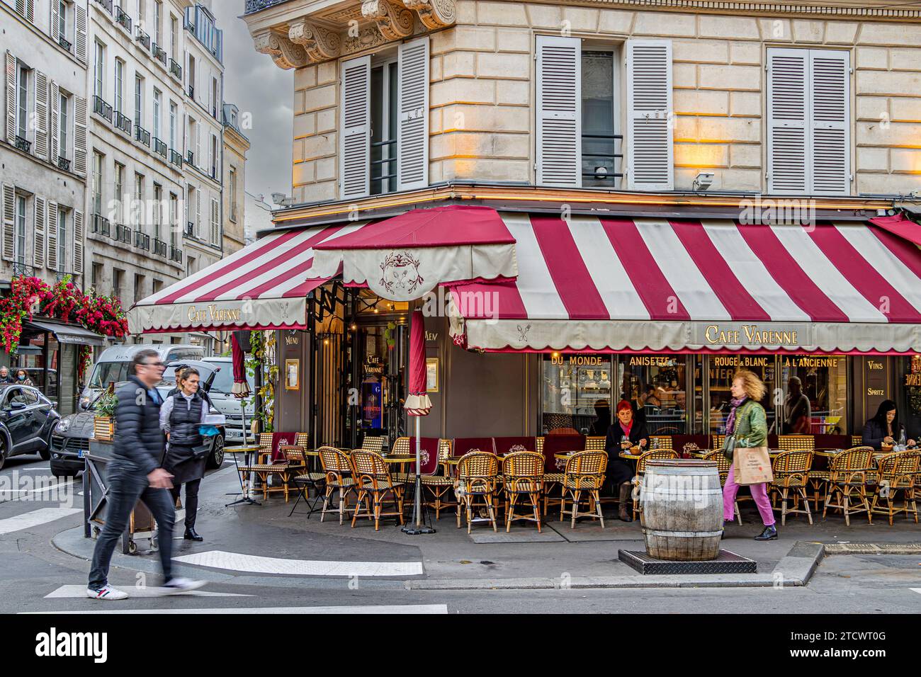 People sitting outside on the terrace at Café Varenne a restaurant ...
