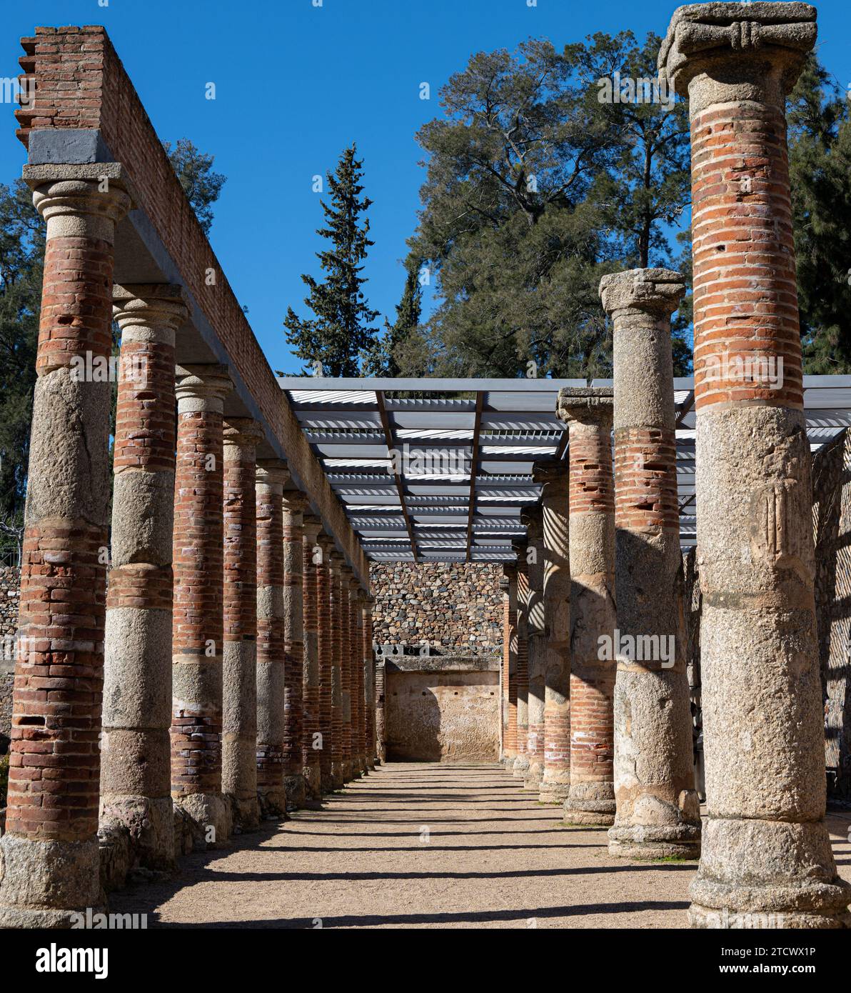 Ancient Roman ruins form Merida, Spain with columns on a sunny day ...