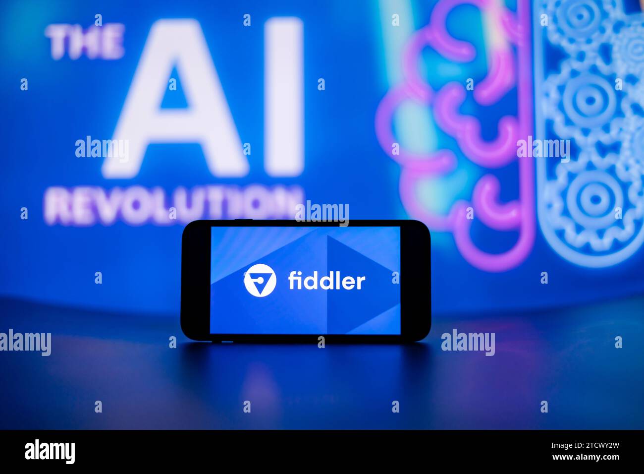 In this photo illustration, the Fiddler logo seen displayed on a mobile ...