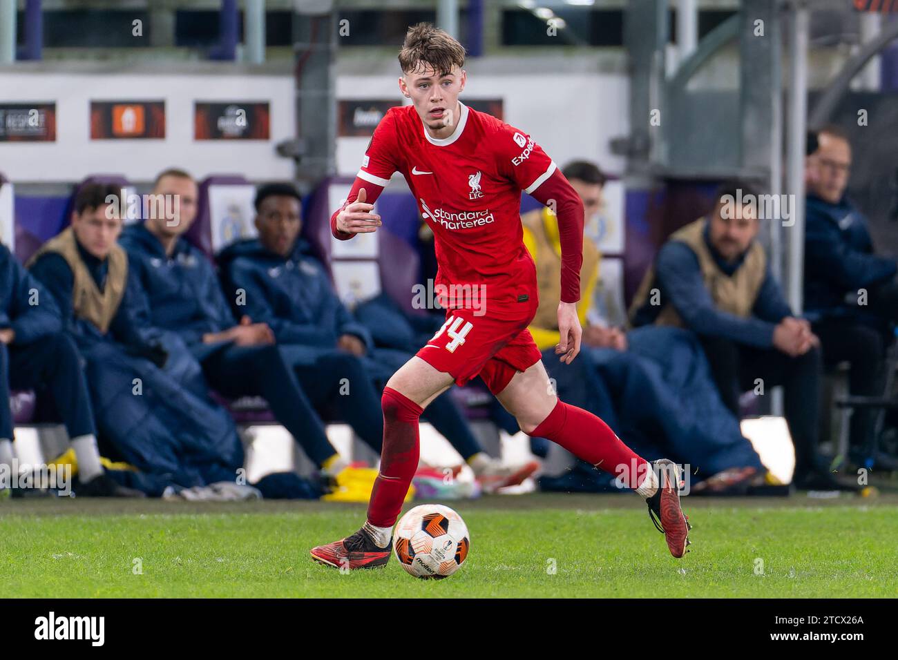 Conor bradley of liverpool runs with the ball hi-res stock photography ...