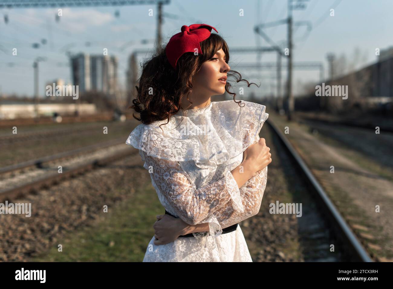 Young woman at the old train stop Stock Photo - Alamy
