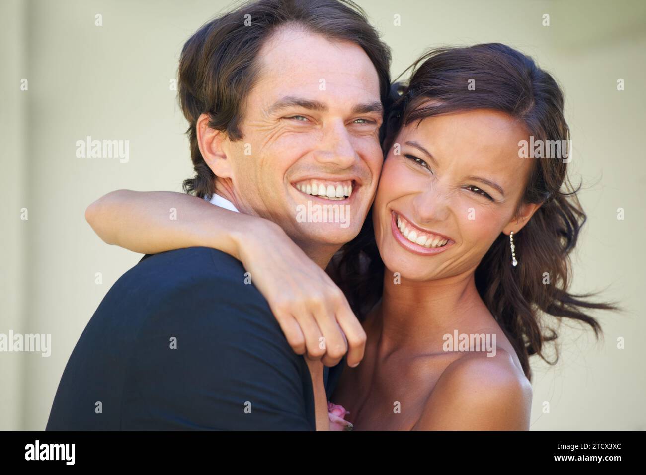 Couple, hug and wedding day with happiness, ceremony and commitment for ...