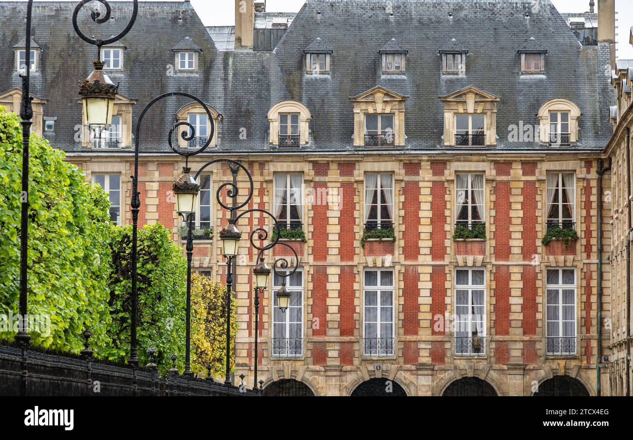 Close up of the beautiful 17th century buildings surrounding Place des ...