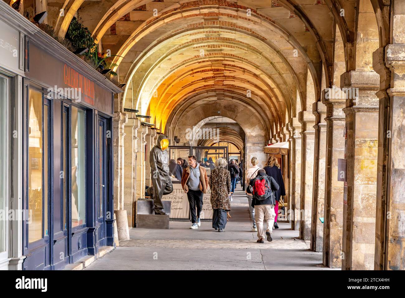 The Vaulted Arches of Place des Vosges, Paris, France Stock Photo - Alamy