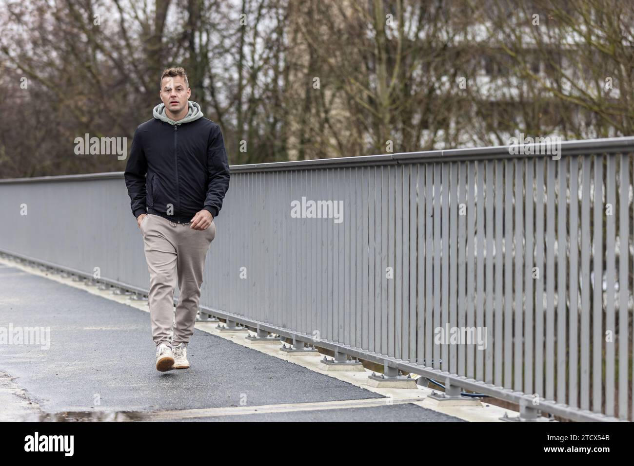 Cottbus, Germany. 14th Dec, 2023. Singer Alexander Knappe walks on a ...