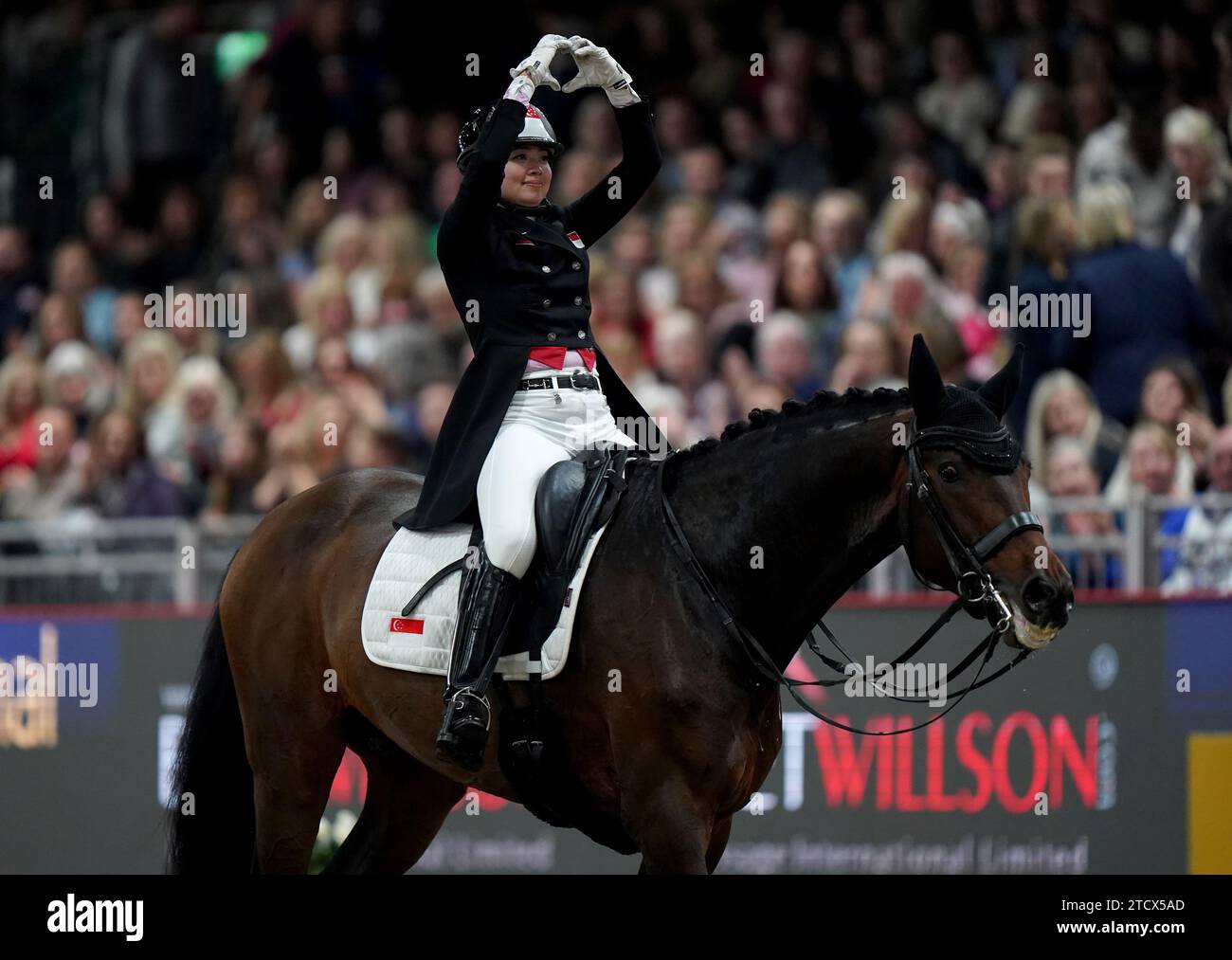 Blue Hors Zatchmo ridden by Singapore's Caroline Chew reacts following ...