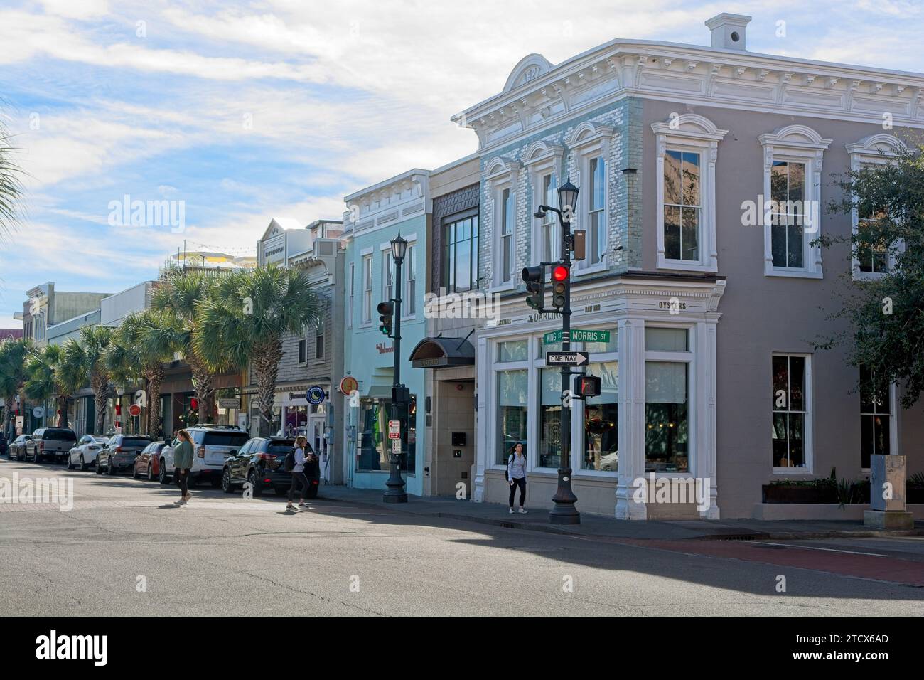 Multi-colored store fronts on revitalized upper King street in historic ...