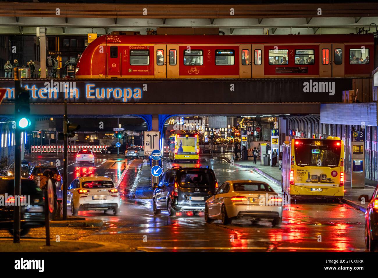 Central station in the city centre of Essen, dense traffic, local train ...