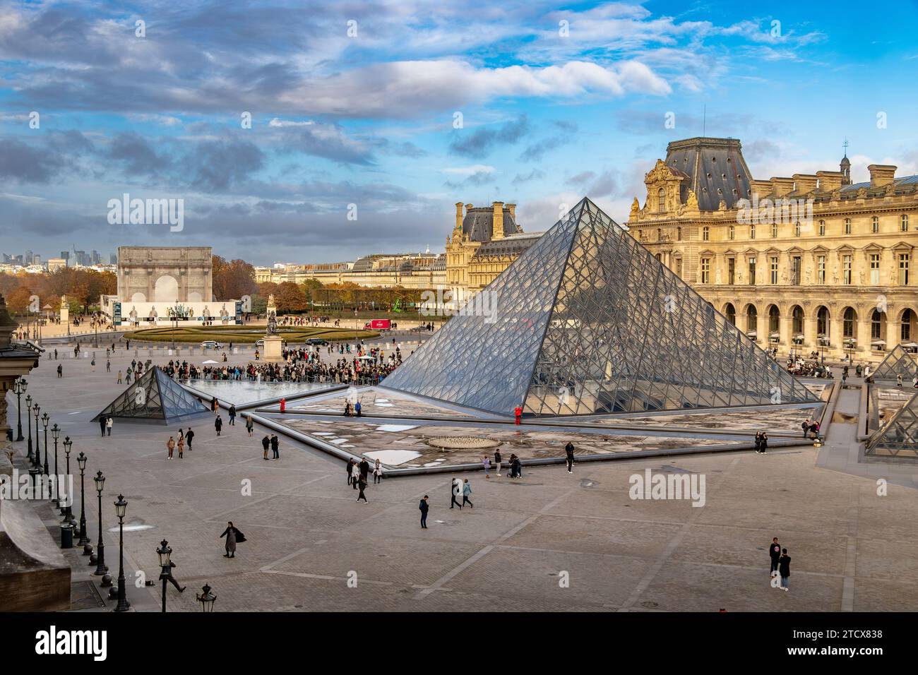 The Louvre Pyramid is a large glass-and-metal structure The pyramid and ...