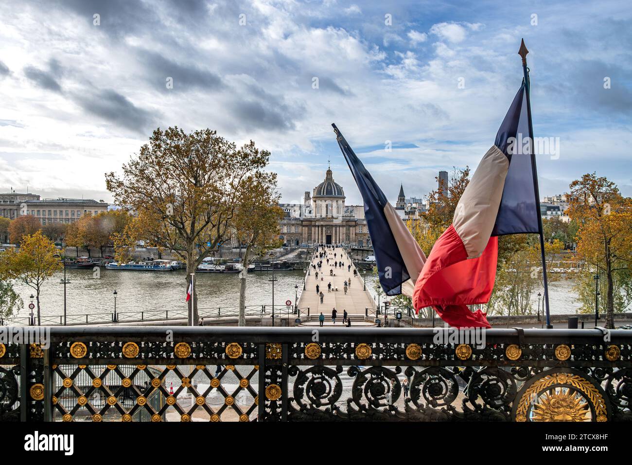 The French Flag and The Pont des Arts , a pedestrian footbridge across ...