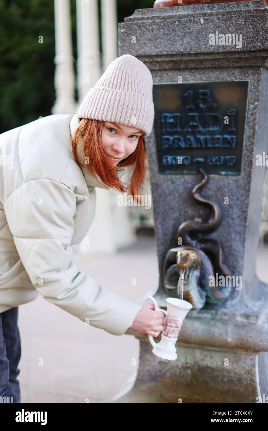 Girl drinking mineral water from hi-res stock photography and images ...