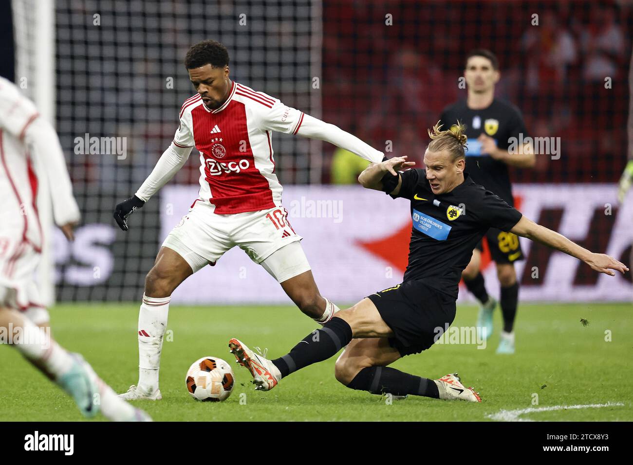 AMSTERDAM - (l-r) Chuba Akpom of Ajax, Domagoj Vida of AEK Athens ...
