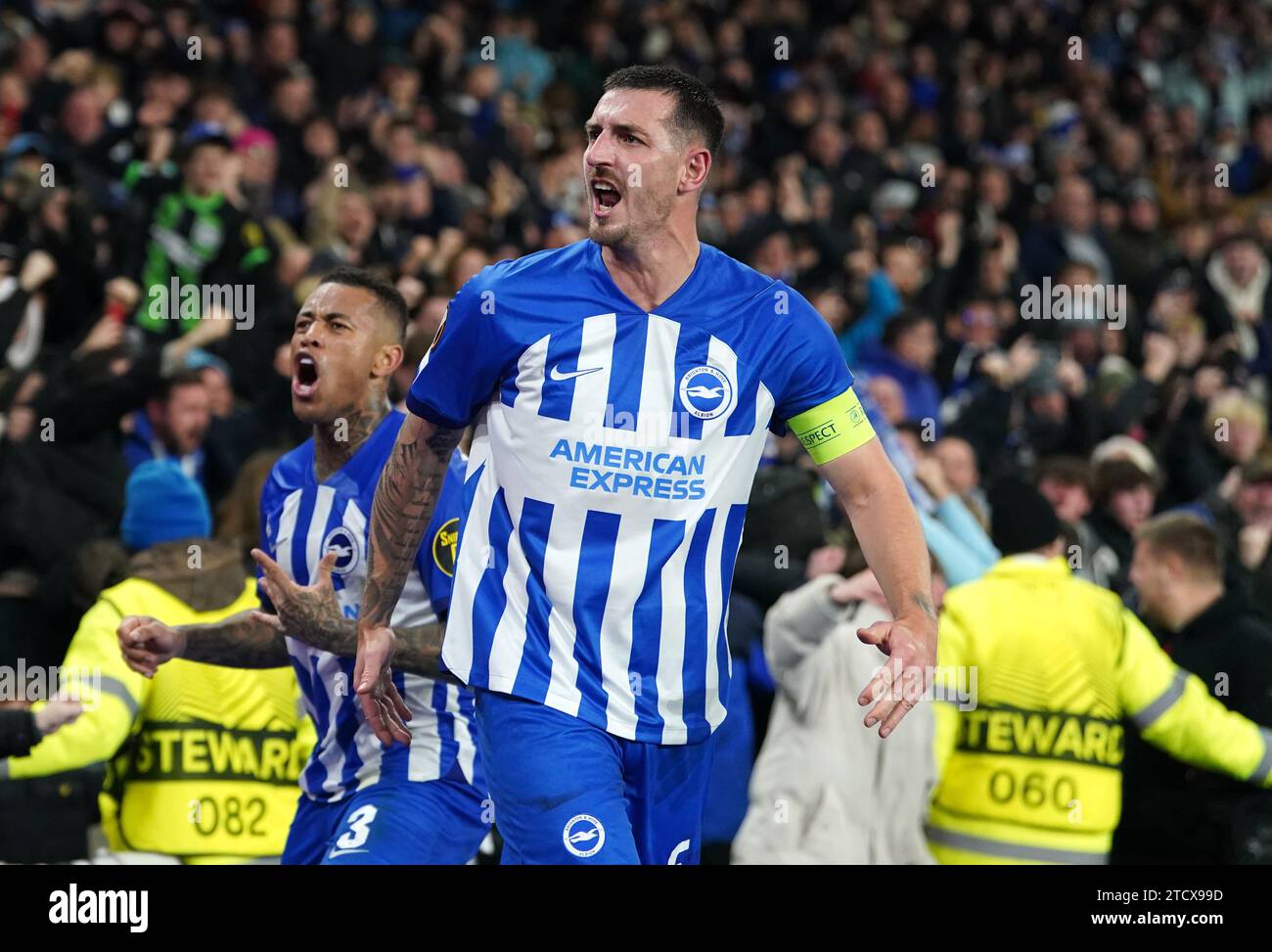 Brighton and Hove Albion's Lewis Dunk celebrates after Joao Pedro ...