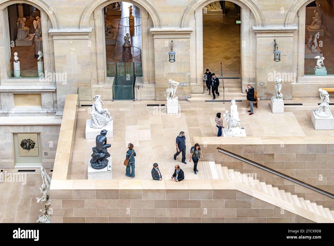 Sculptures in the glass-roofed courtyard known as Cour Marly in the ...