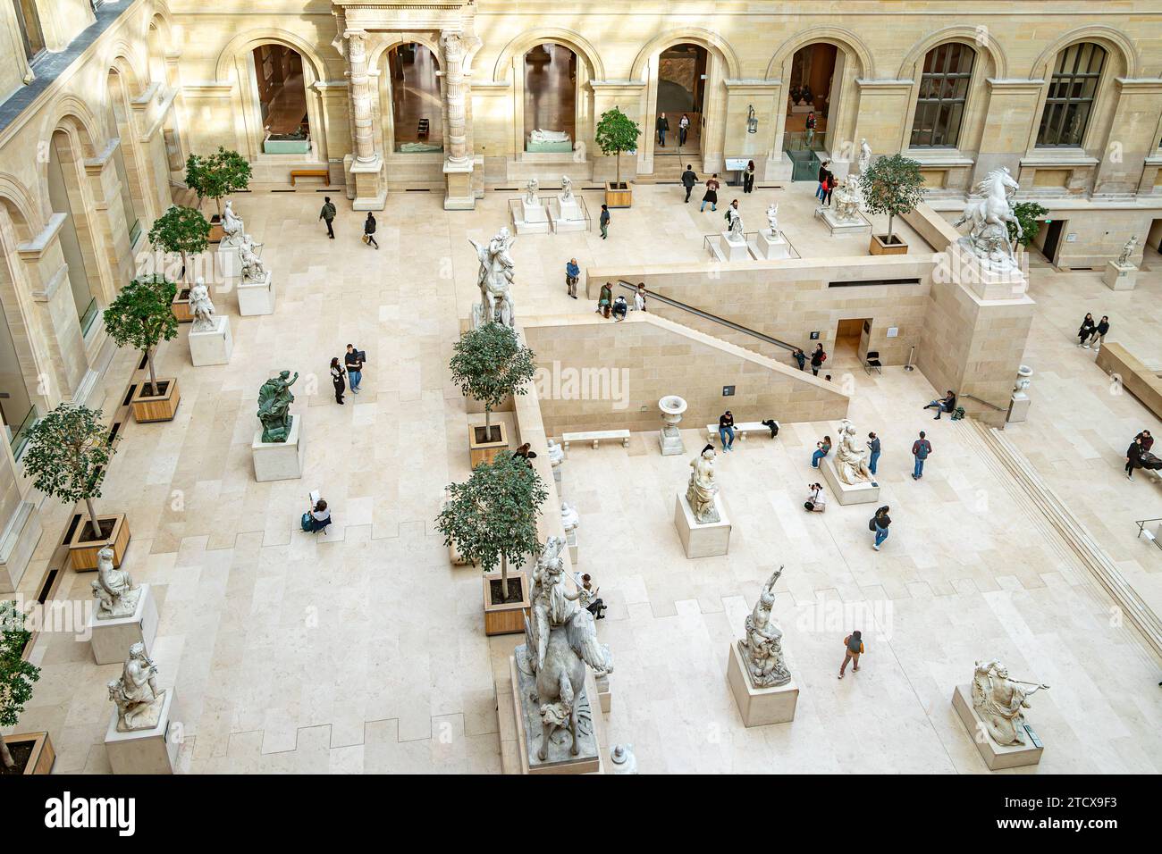 Sculptures in the glass-roofed courtyard known as Cour Marly in the ...