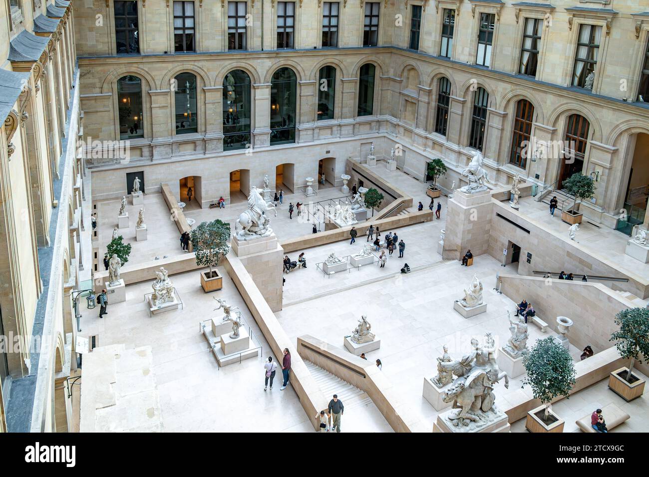 Sculptures in the glass-roofed courtyard known as Cour Marly in the ...