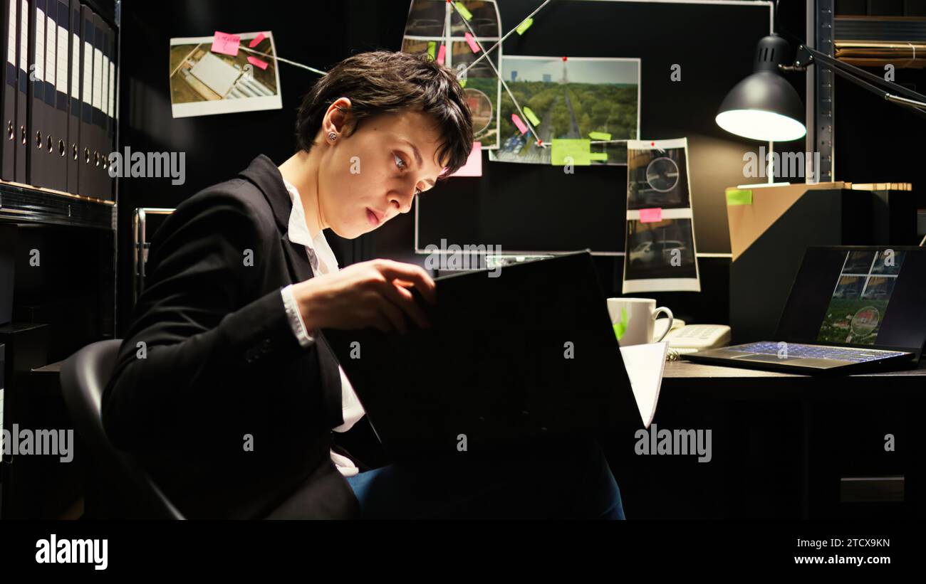 Woman officer reading witness statements hi-res stock photography and ...