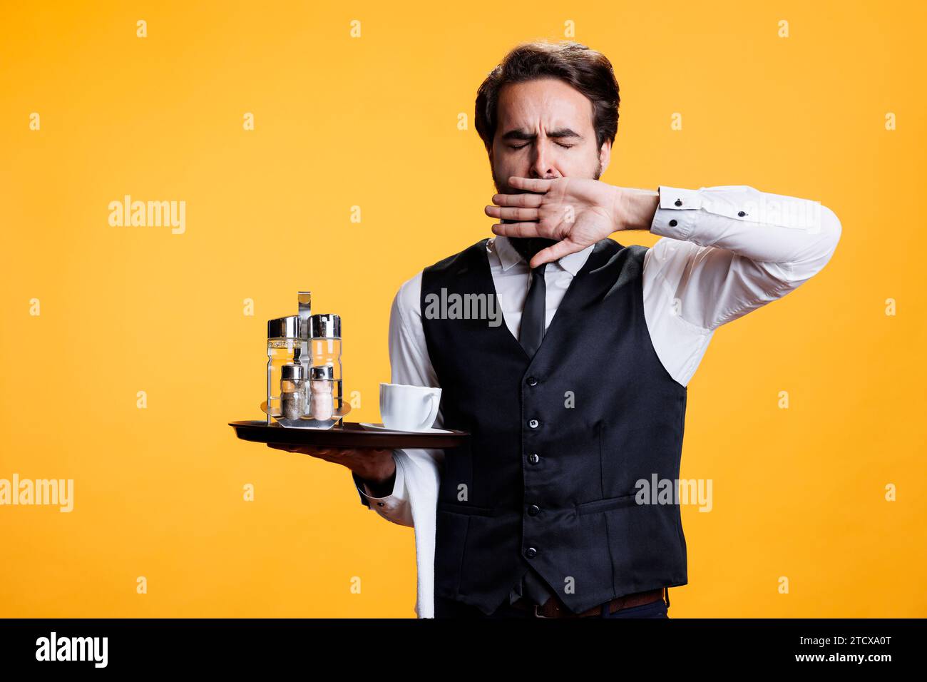 Tired food delivery employee yawning hi-res stock photography and ...