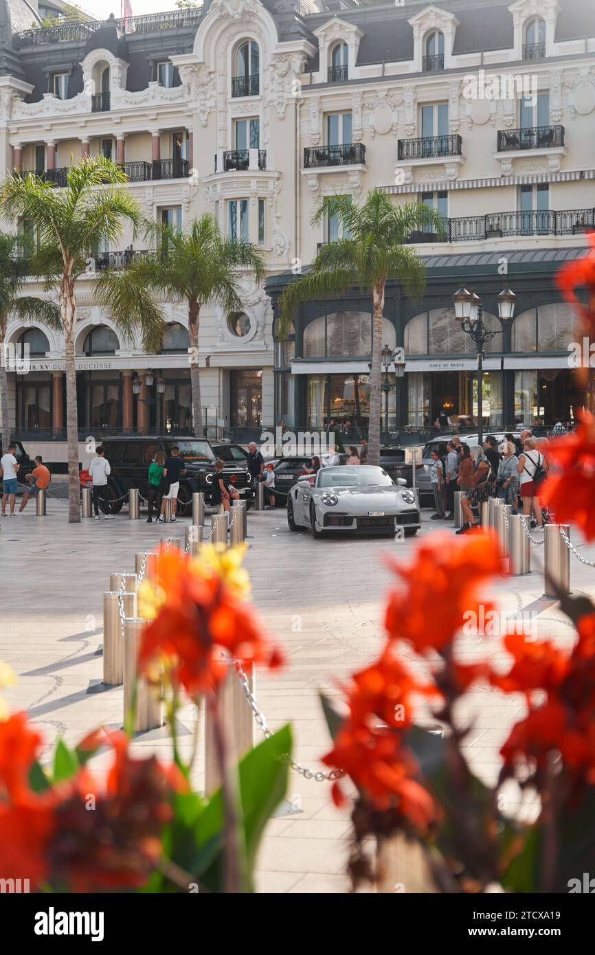Monaco, Monte-Carlo, 22 October 2022: Square Casino Monte-Carlo at sunset, luxury cars, famous ...
