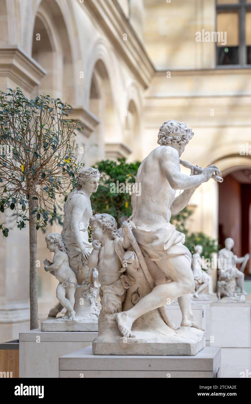 Sculptures in the glass-roofed courtyard known as Cour Marly in the ...