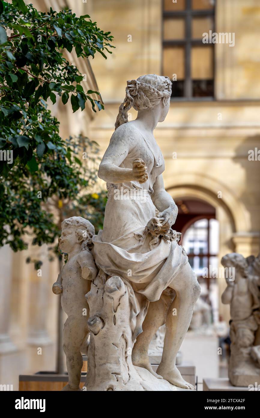 Sculptures in the glass-roofed courtyard known as Cour Marly in the ...