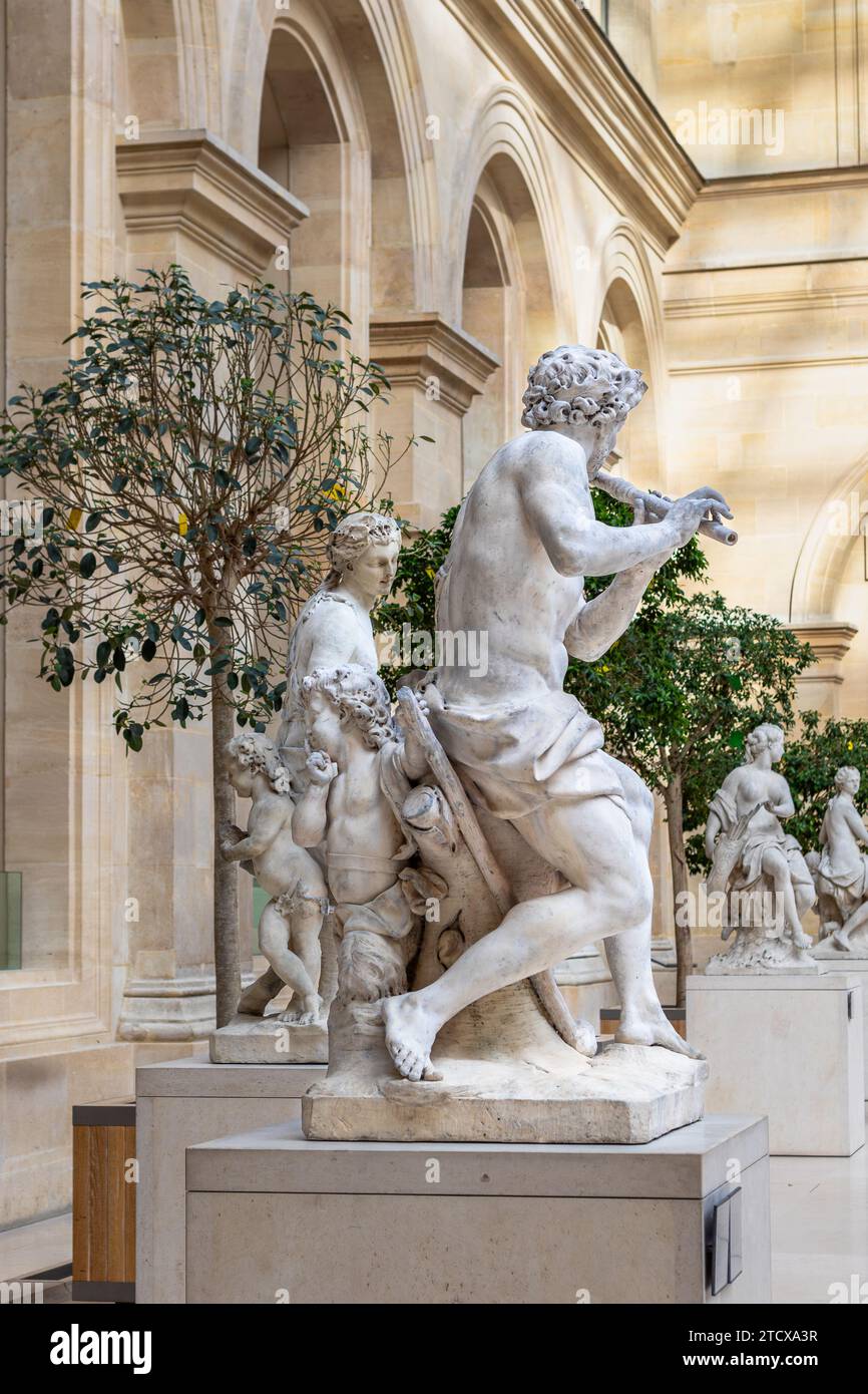 Sculptures in the glass-roofed courtyard known as Cour Marly in the ...