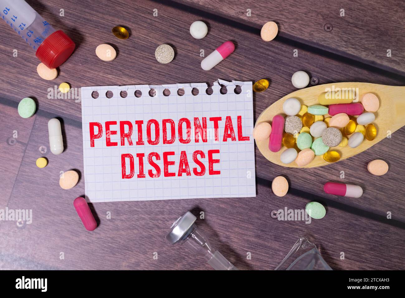 Closeup of pencil eraser and black periodontal disease text ...