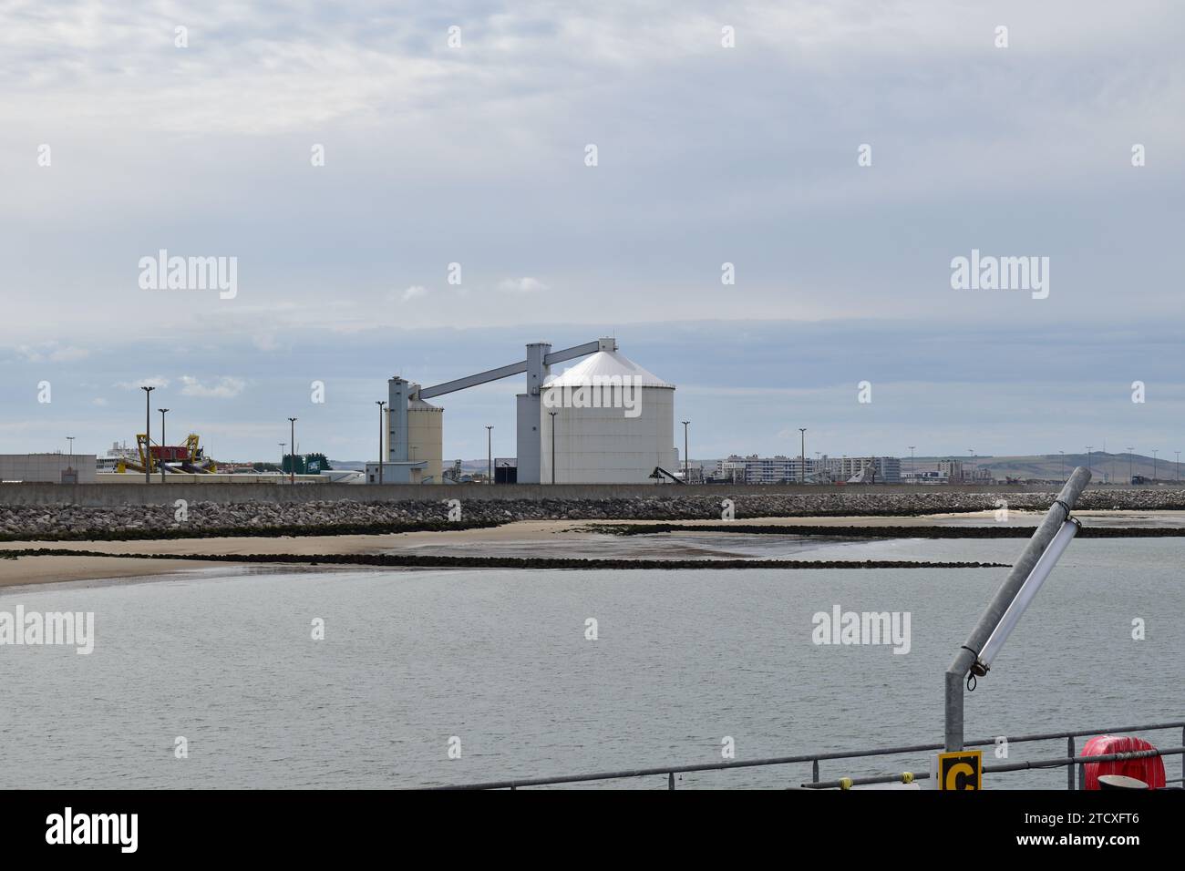 Large storage silo on the pier in the port of Calais as seen from a ...