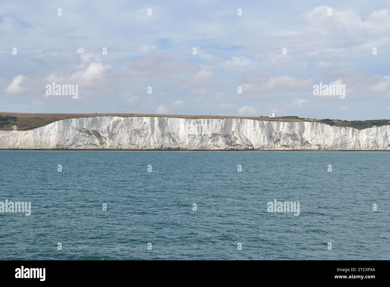The majestic white cliffs of Dover as seen from a ship sailing near the ...