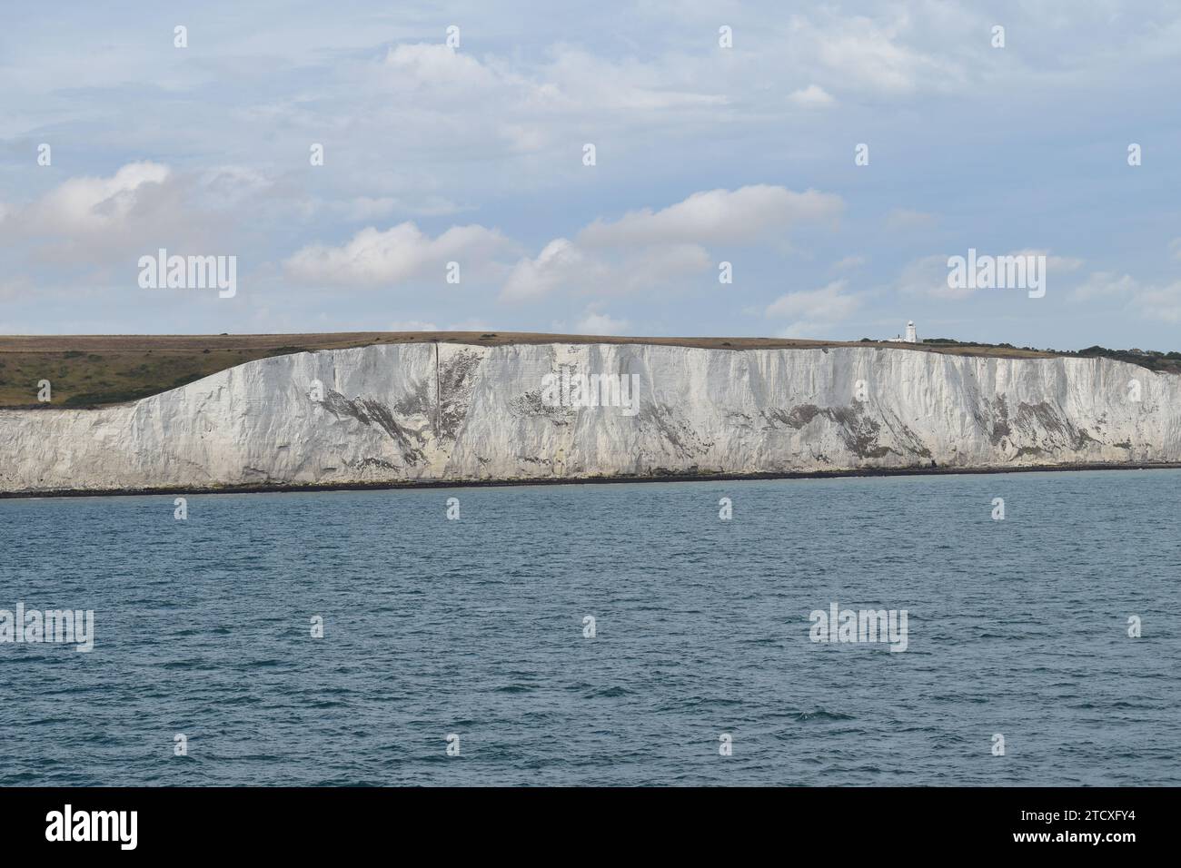 The majestic white cliffs of Dover as seen from a ship sailing near the ...