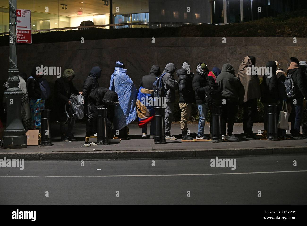 New York, New York, USA. 14th Dec, 2023. As migrants continue to arrive ...