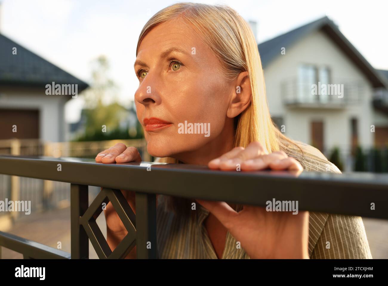 Concept Of Private Life Curious Senior Woman Spying On Neighbours Over