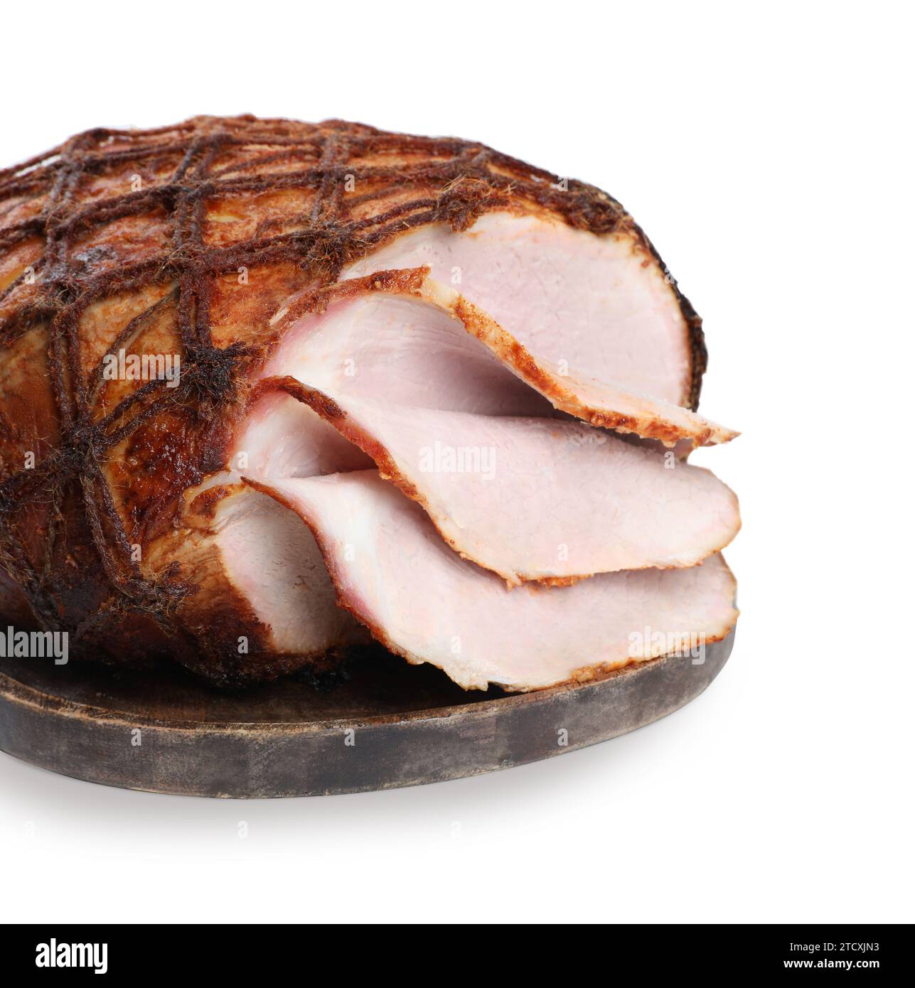 Cut delicious baked ham isolated on white Stock Photo - Alamy