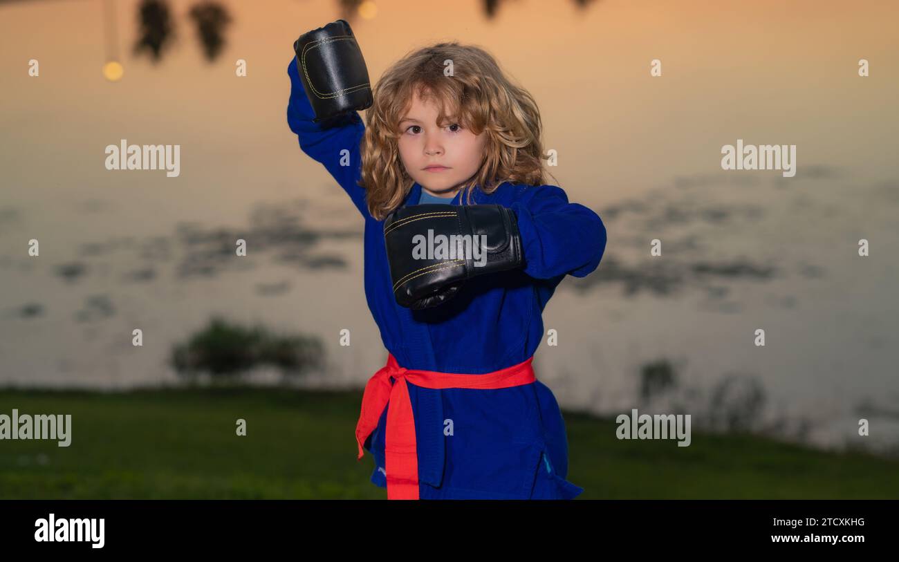 Kid boy practicing karate outdoor. Sport karate kids. Little boy ...