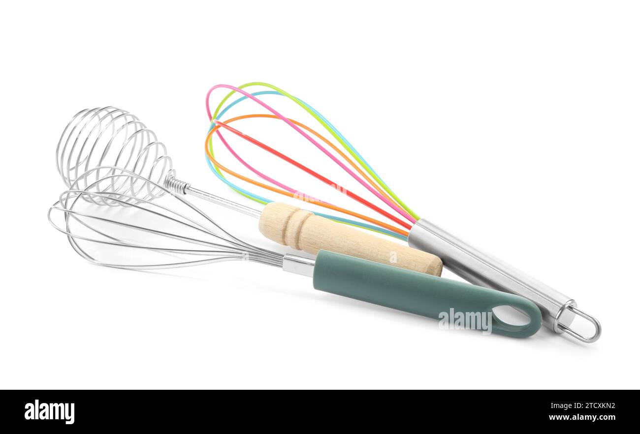Many different whisks isolated on white. Kitchen utensils Stock Photo ...