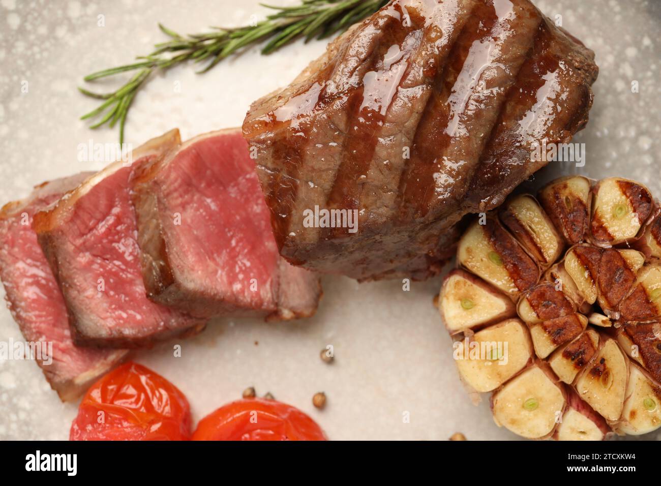 Delicious grilled beef steak with spices on plate, top view Stock Photo ...
