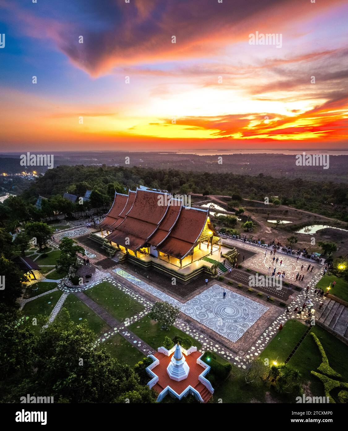 Aerial view of Wat Sirindhorn Wararam glowing temple in Ubon, Thailand ...