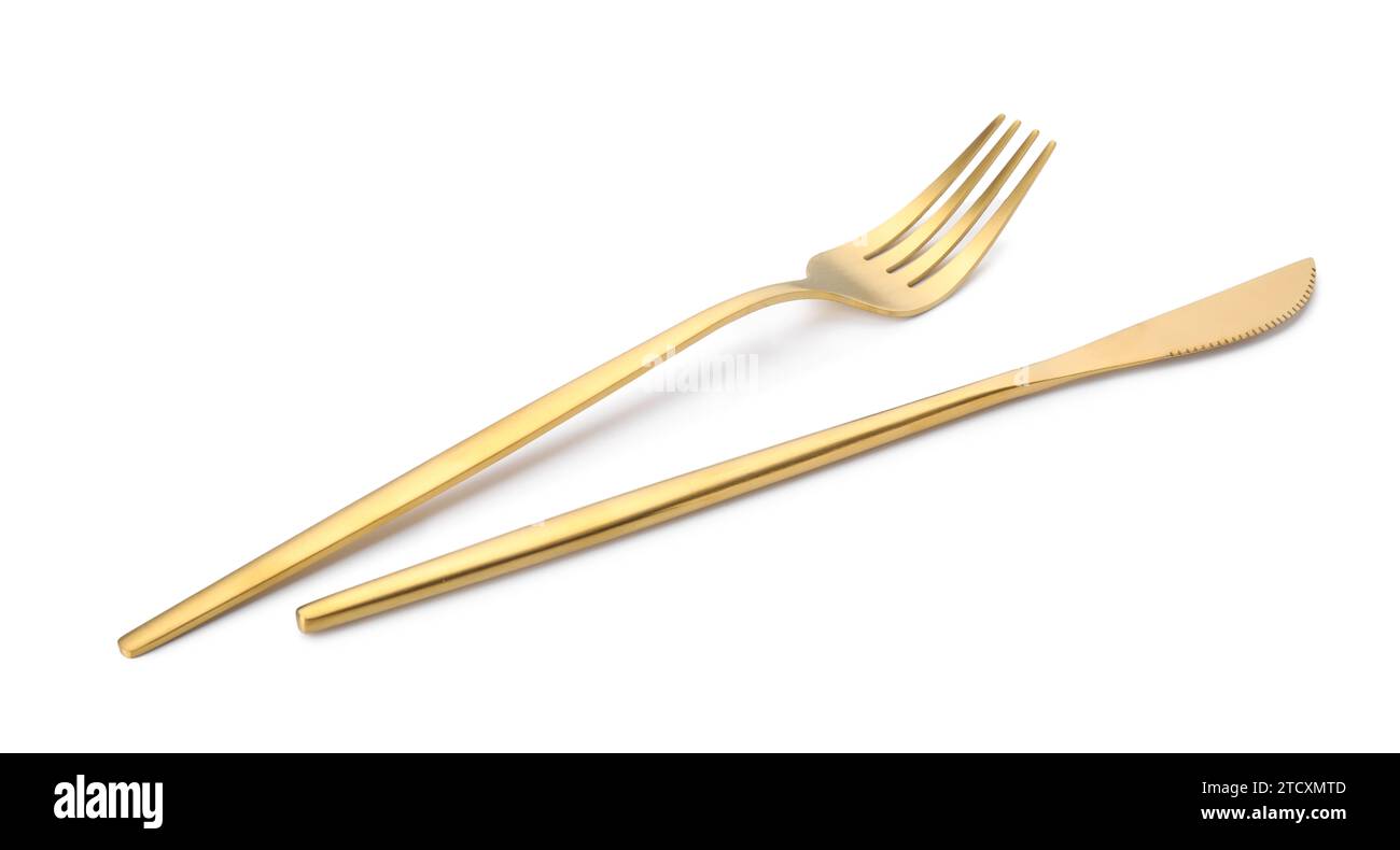 Shiny golden fork and knife isolated on white. Luxury cutlery Stock ...