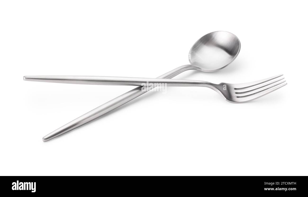 Shiny silver fork and spoon isolated on white. Luxury cutlery Stock ...