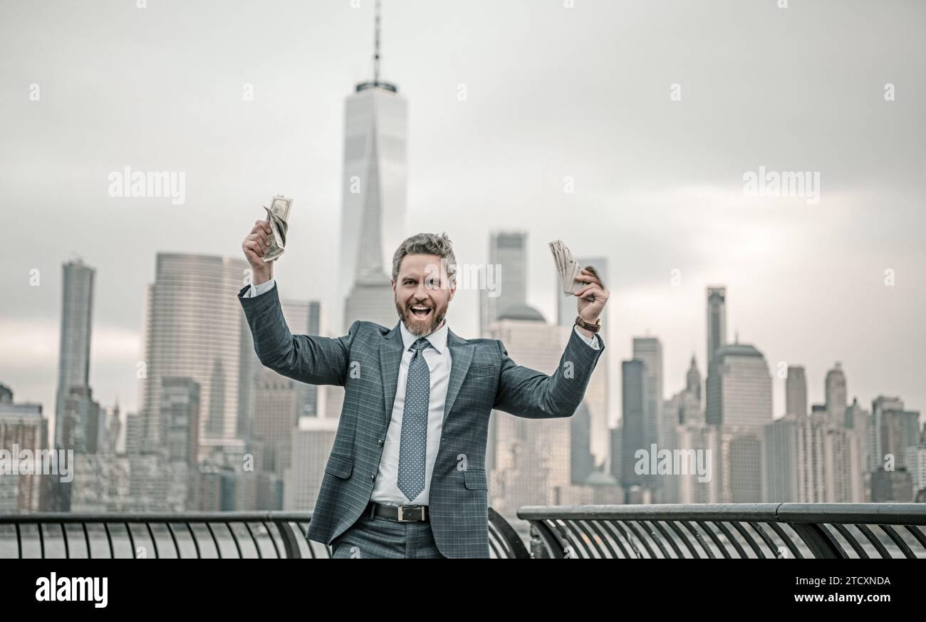 Business in USA. Excited millennial Businessman with money dollars in ...