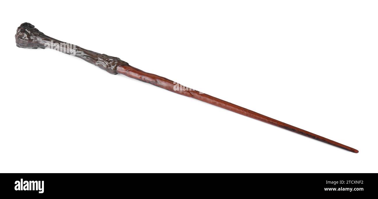 One wooden magic wand isolated on white Stock Photo - Alamy