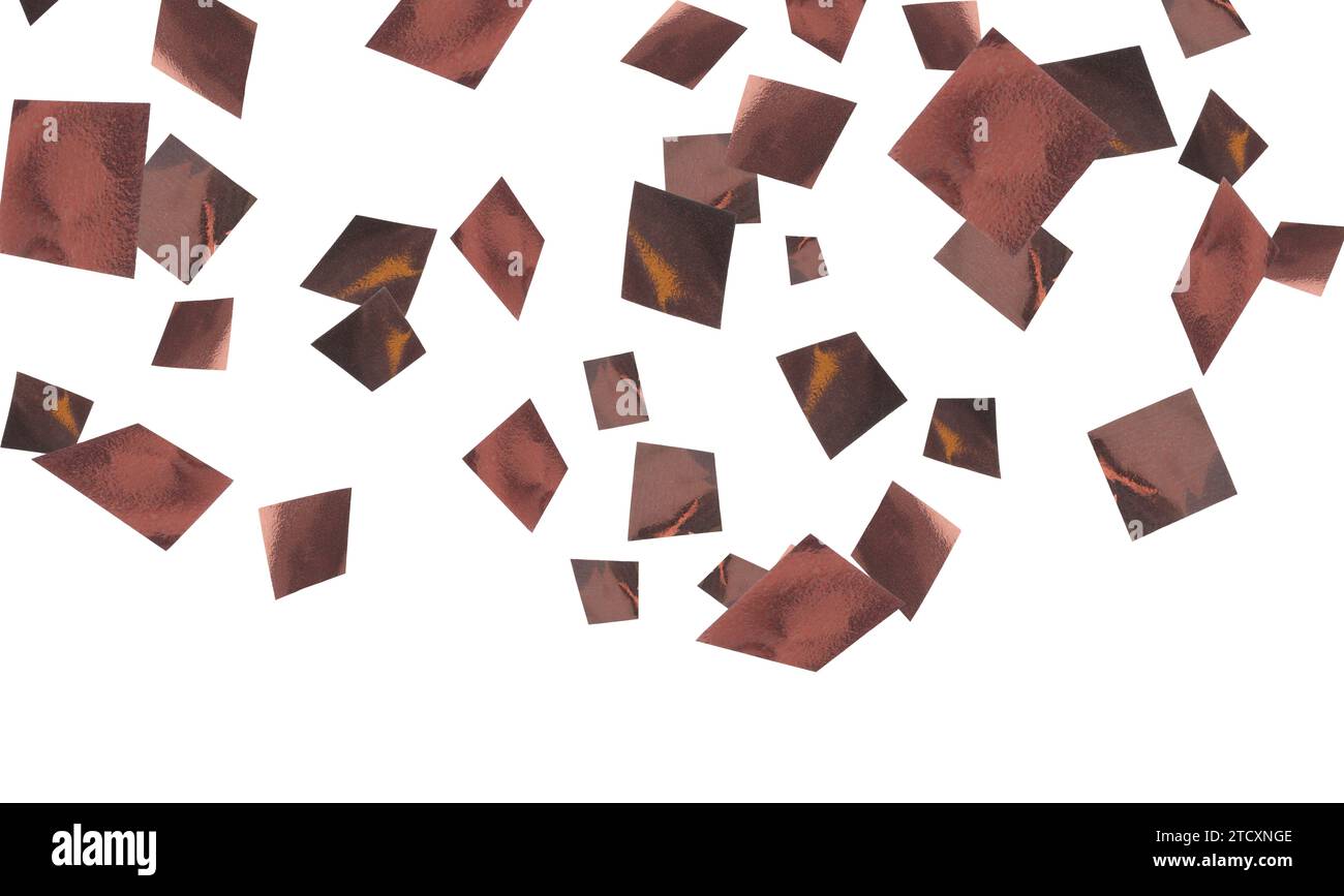 Shiny bronze confetti falling on white background Stock Photo - Alamy