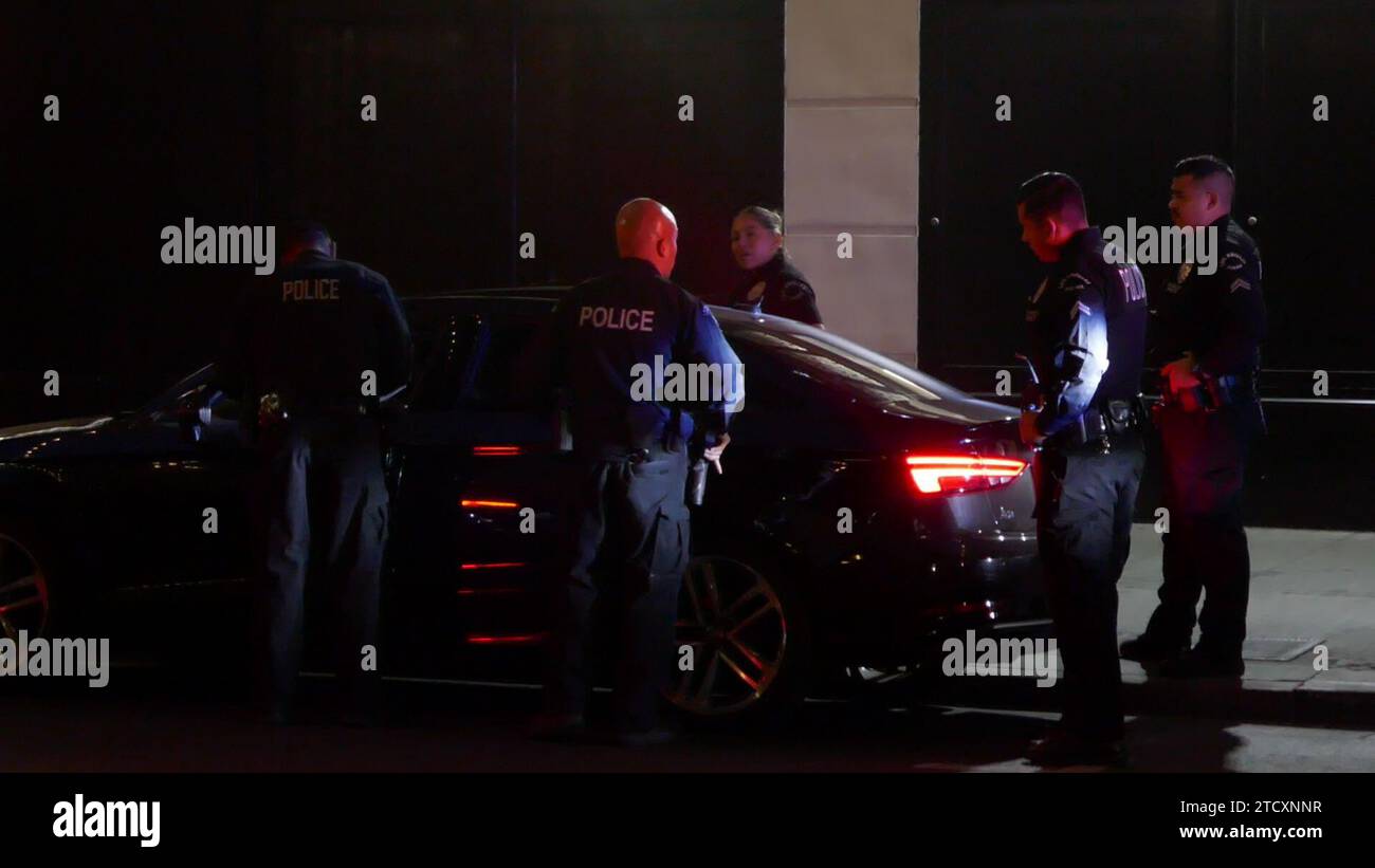 Los Angeles, California, USA 12th December 2023 Police pulling car over ...