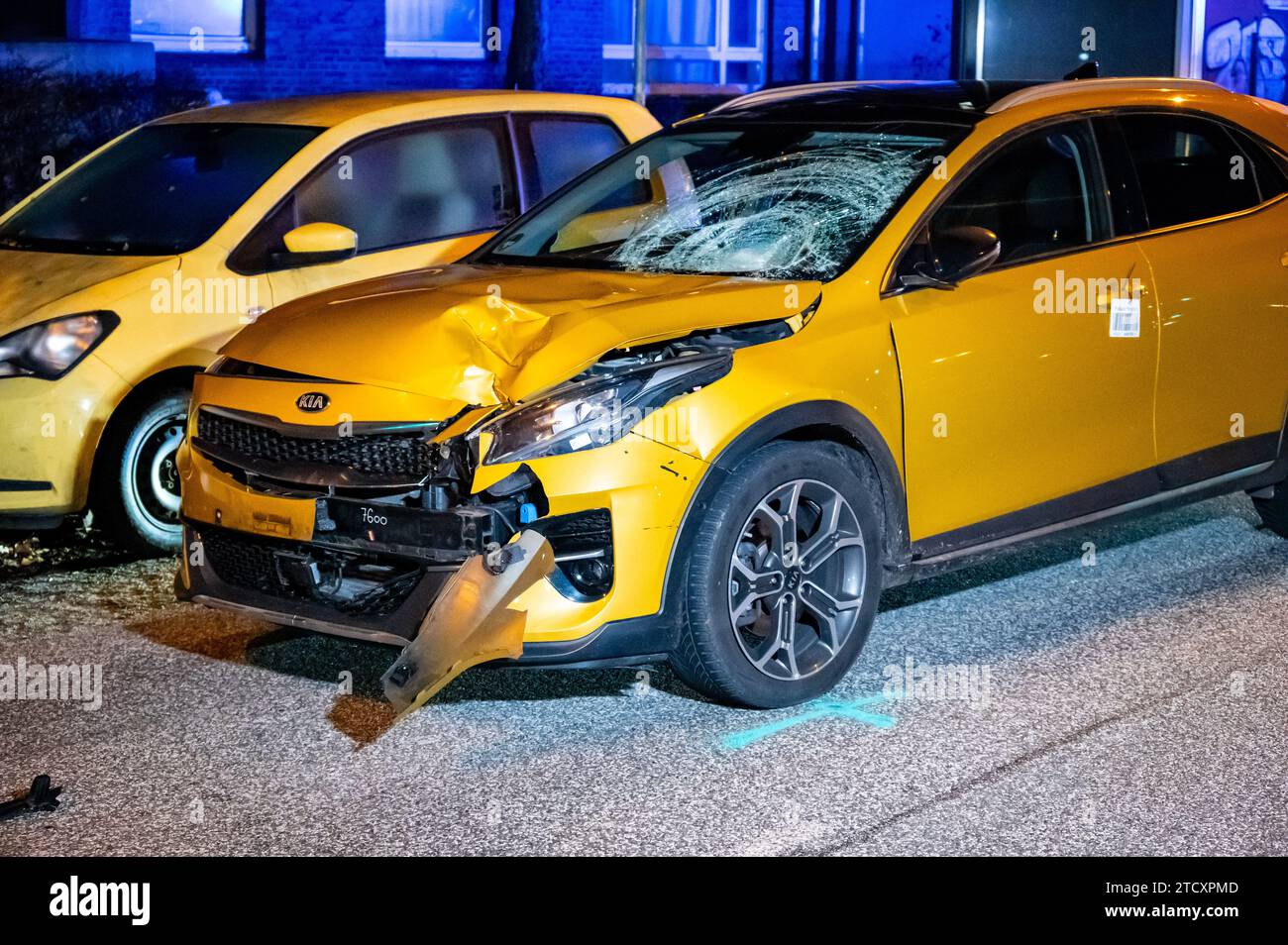 Hamburg, Germany. 14th Dec, 2023. The badly damaged car stands at the ...