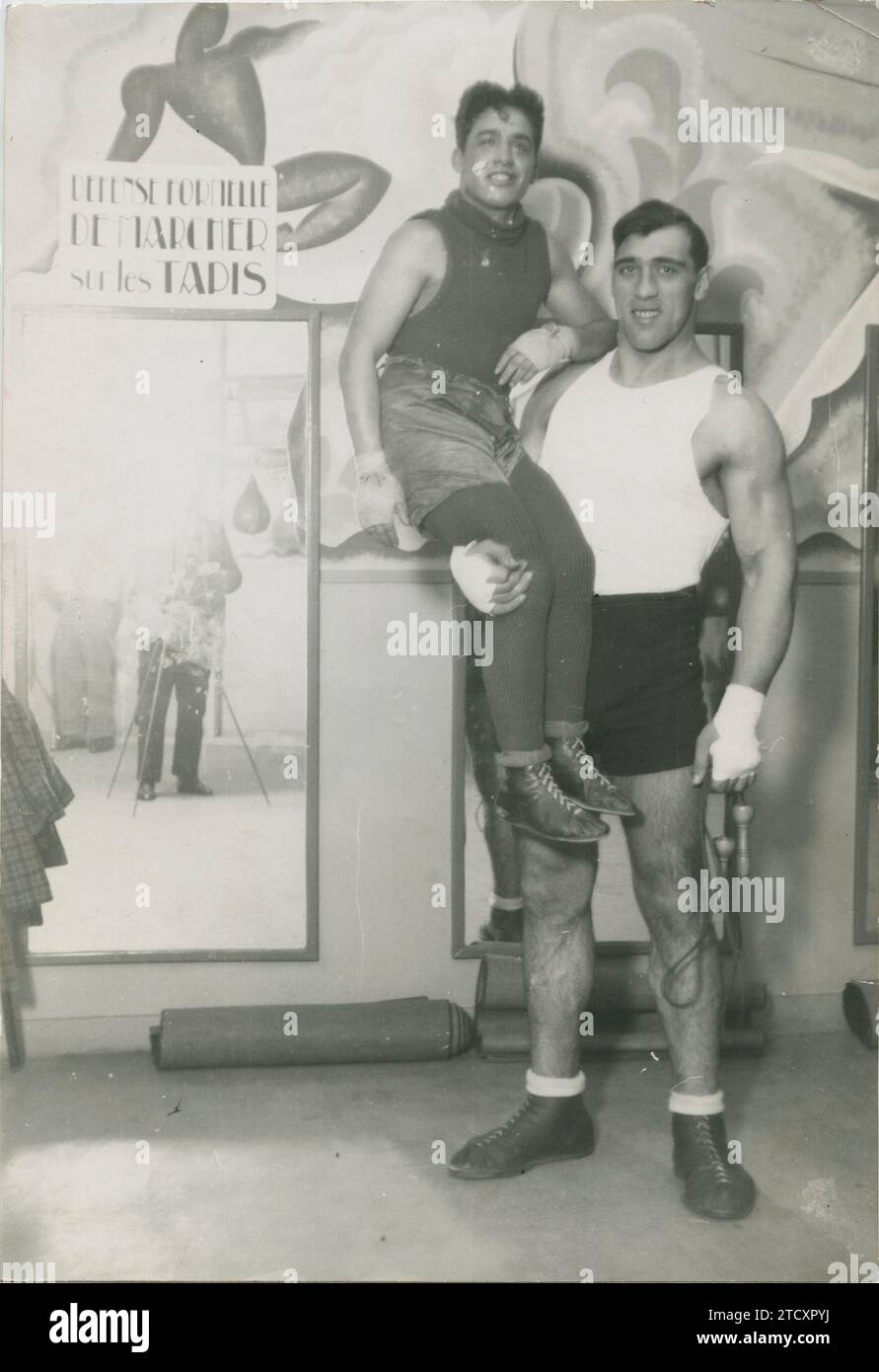 January 1932. Boxer Primo Carnera holds the world flyweight champion ...